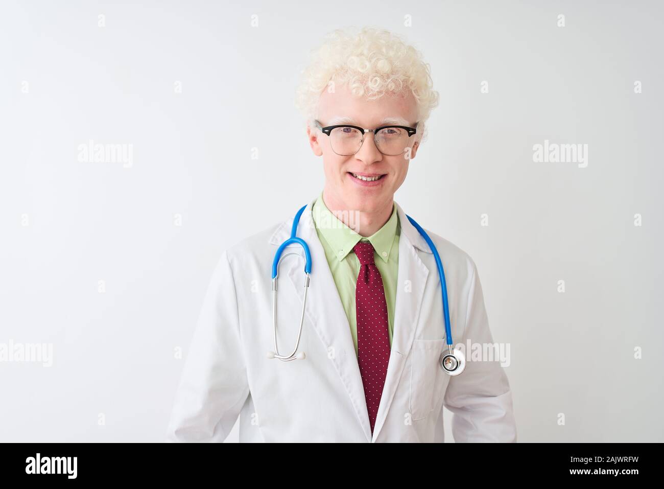 Young albino doctor man wearing stethoscope standing over isolated ...