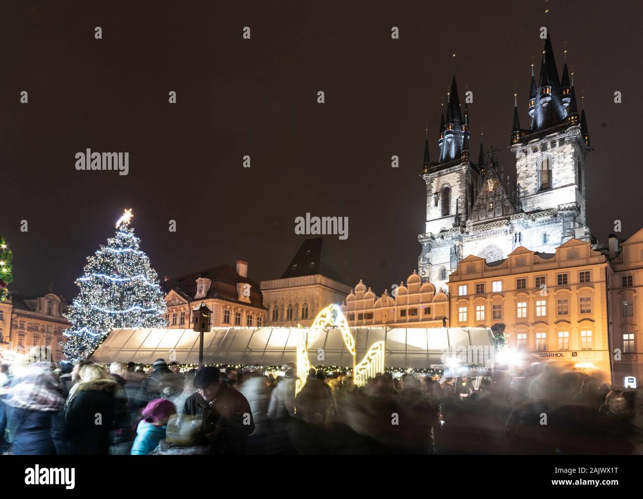Night shot of the Old Town Square, Prague, during the Christmas market ...
