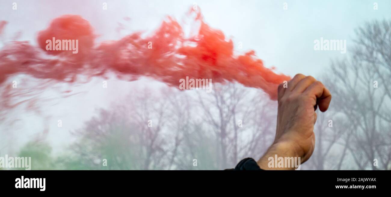 Colorful smoke from a smoke bomb Stock Photo - Alamy