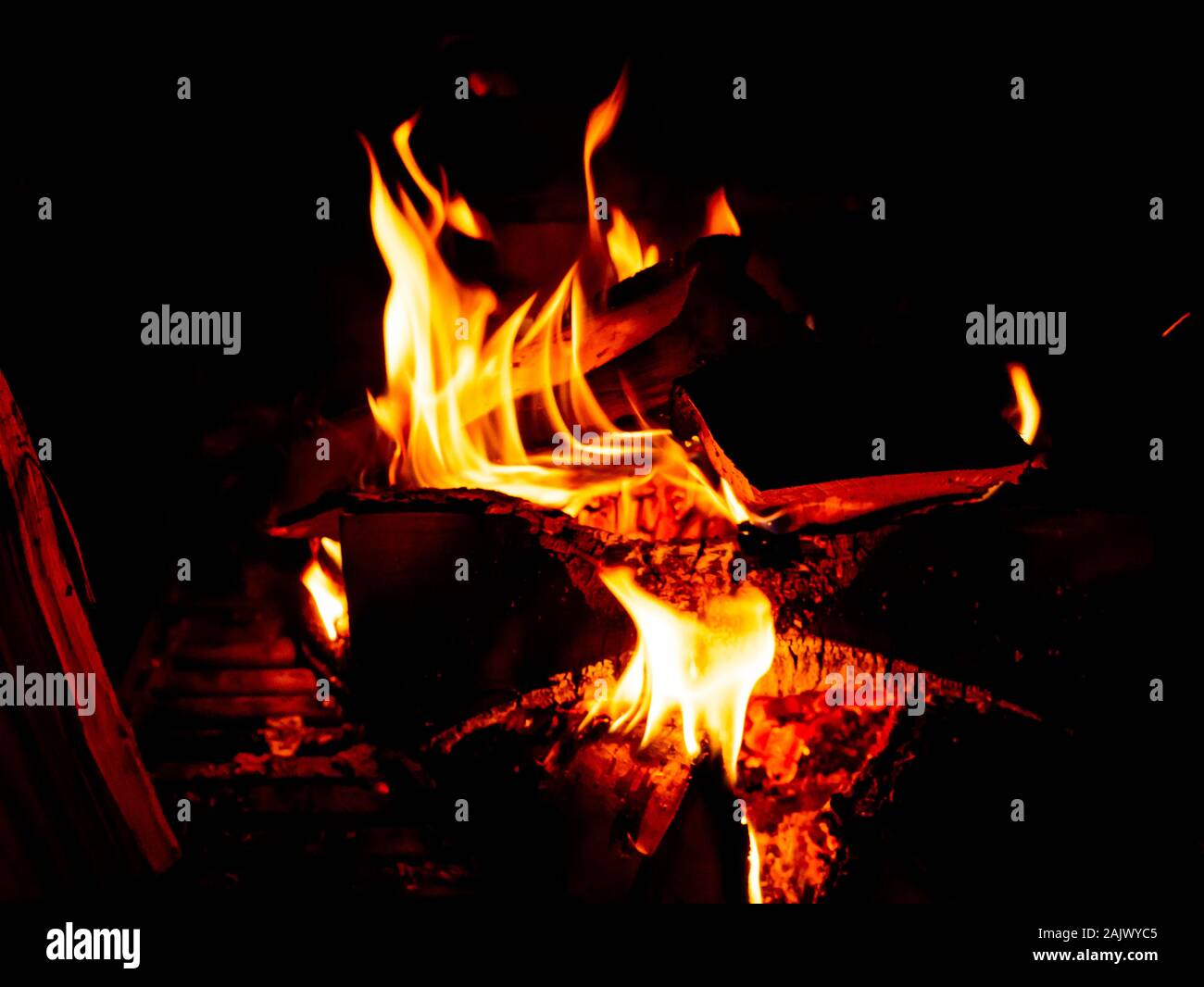 Fire inside the fireplace, heat Stock Photo - Alamy