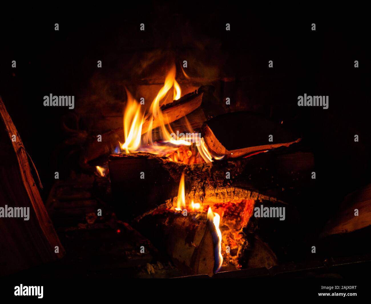 Fire inside the fireplace, heat Stock Photo - Alamy