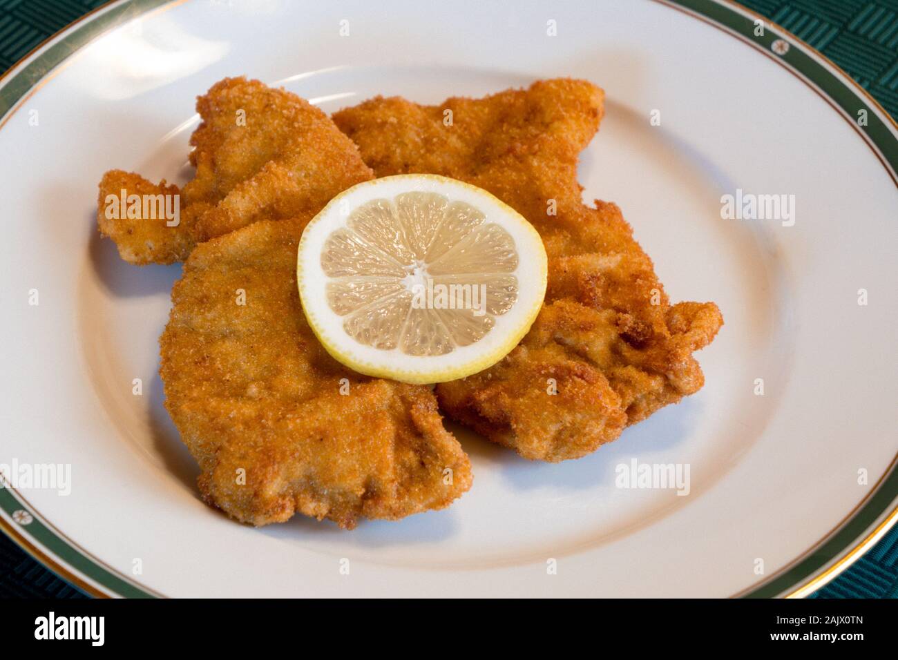 Tasty Viennese Schnitzel or Wiener Schnitzel on an Elegant Plate with ...