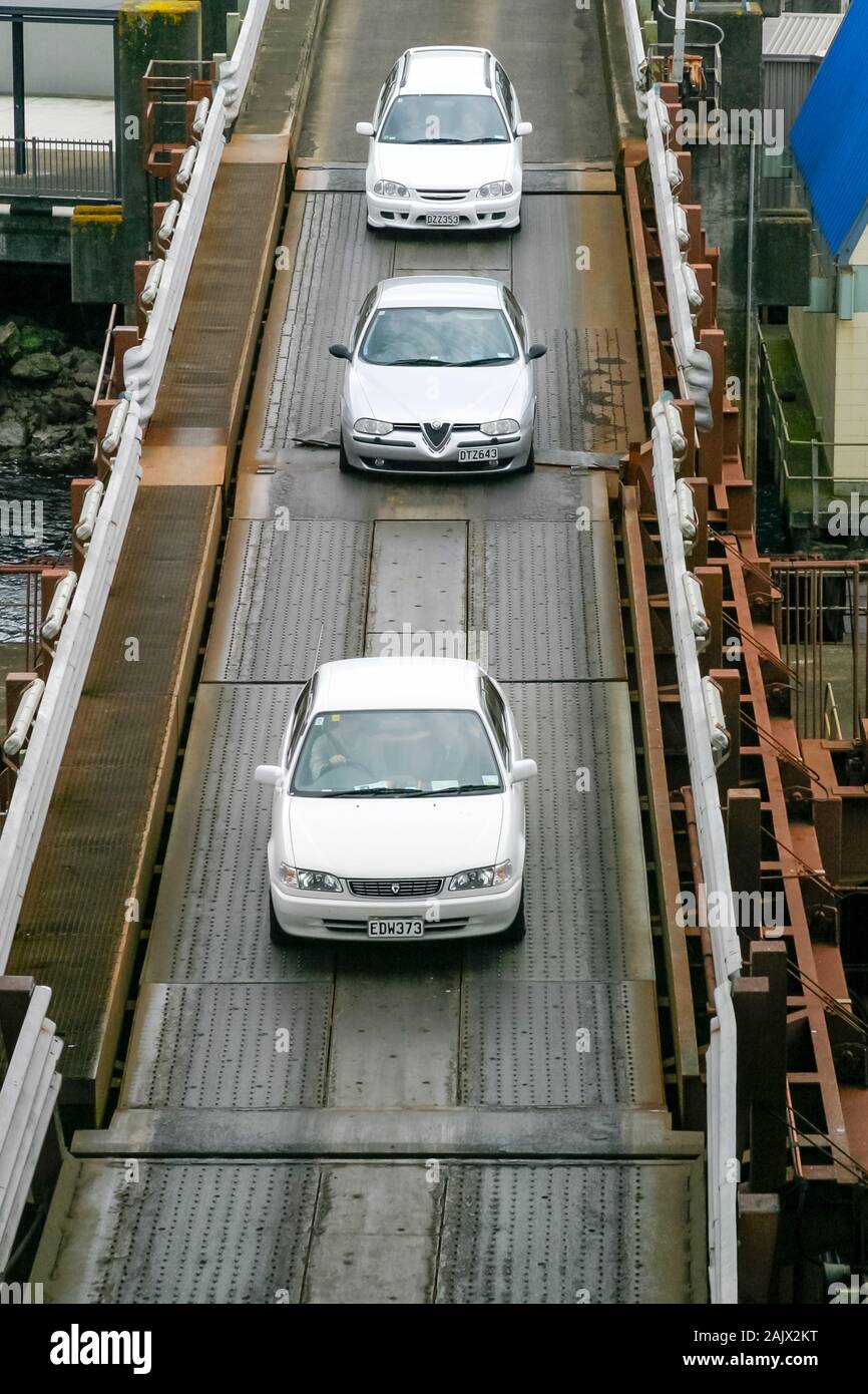 Cars on the vehicle boarding ramp of the Interislander ferry terminal ...