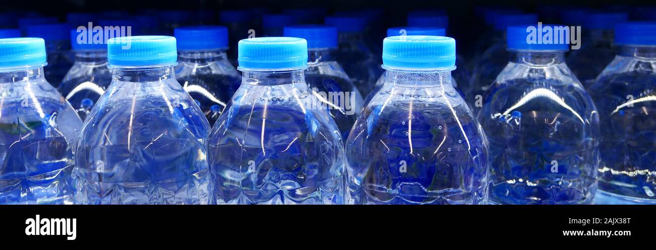 Bottled water in a shop Stock Photo - Alamy