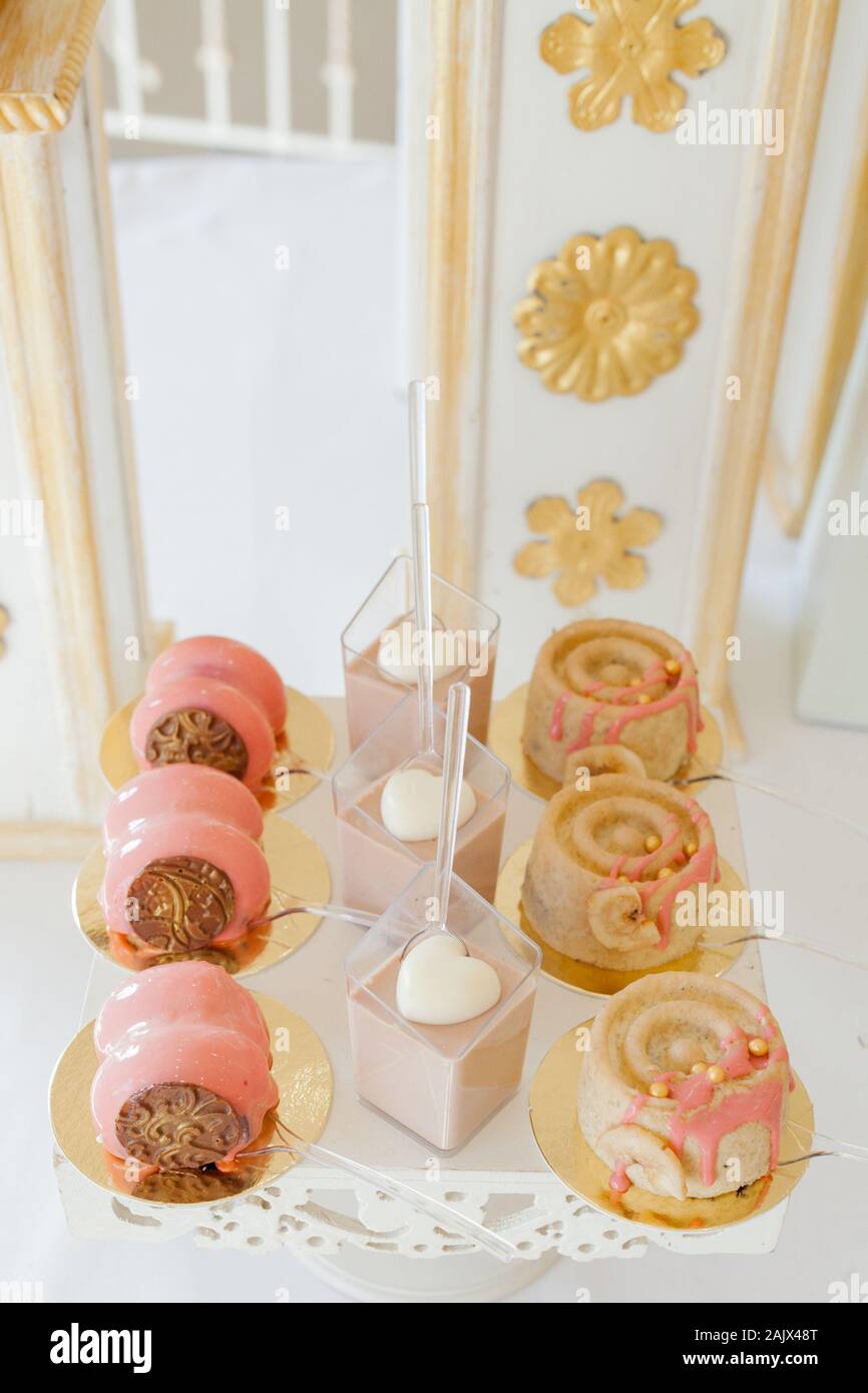 Desserts with fruits, mousse, biscuits. Different types of sweet ...