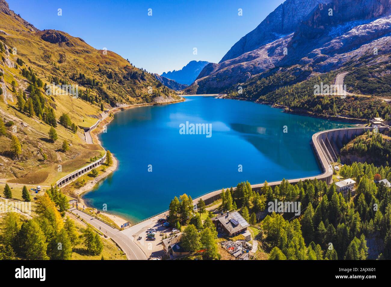 Dam And Mountain Lake At The Fedaia Pass High Resolution Stock ...