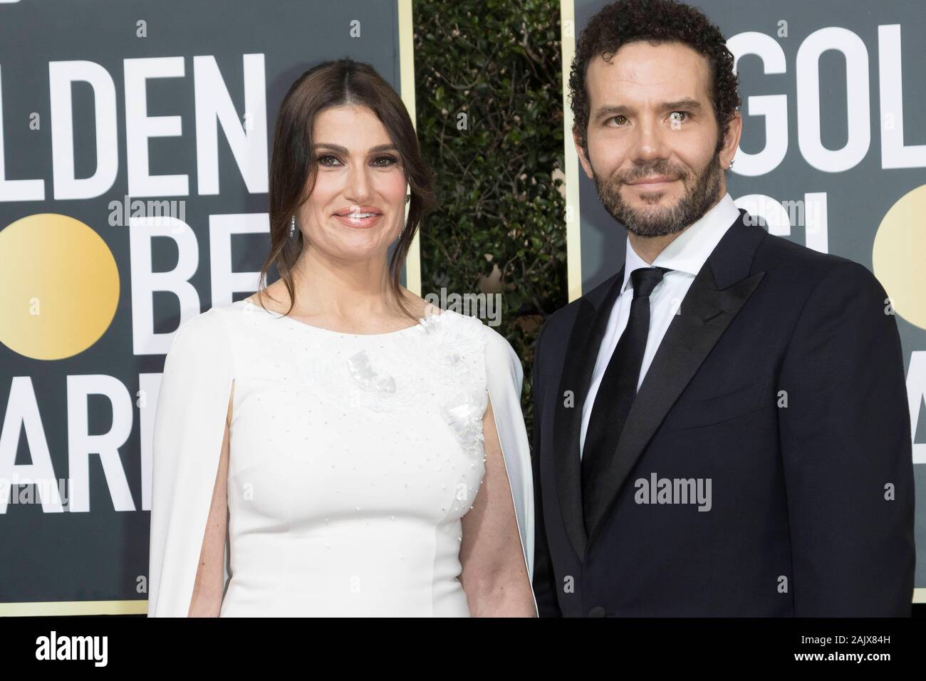 Idina Menzel and Aaron Lohr attend the 77th Annual Golden Globe Awards ...