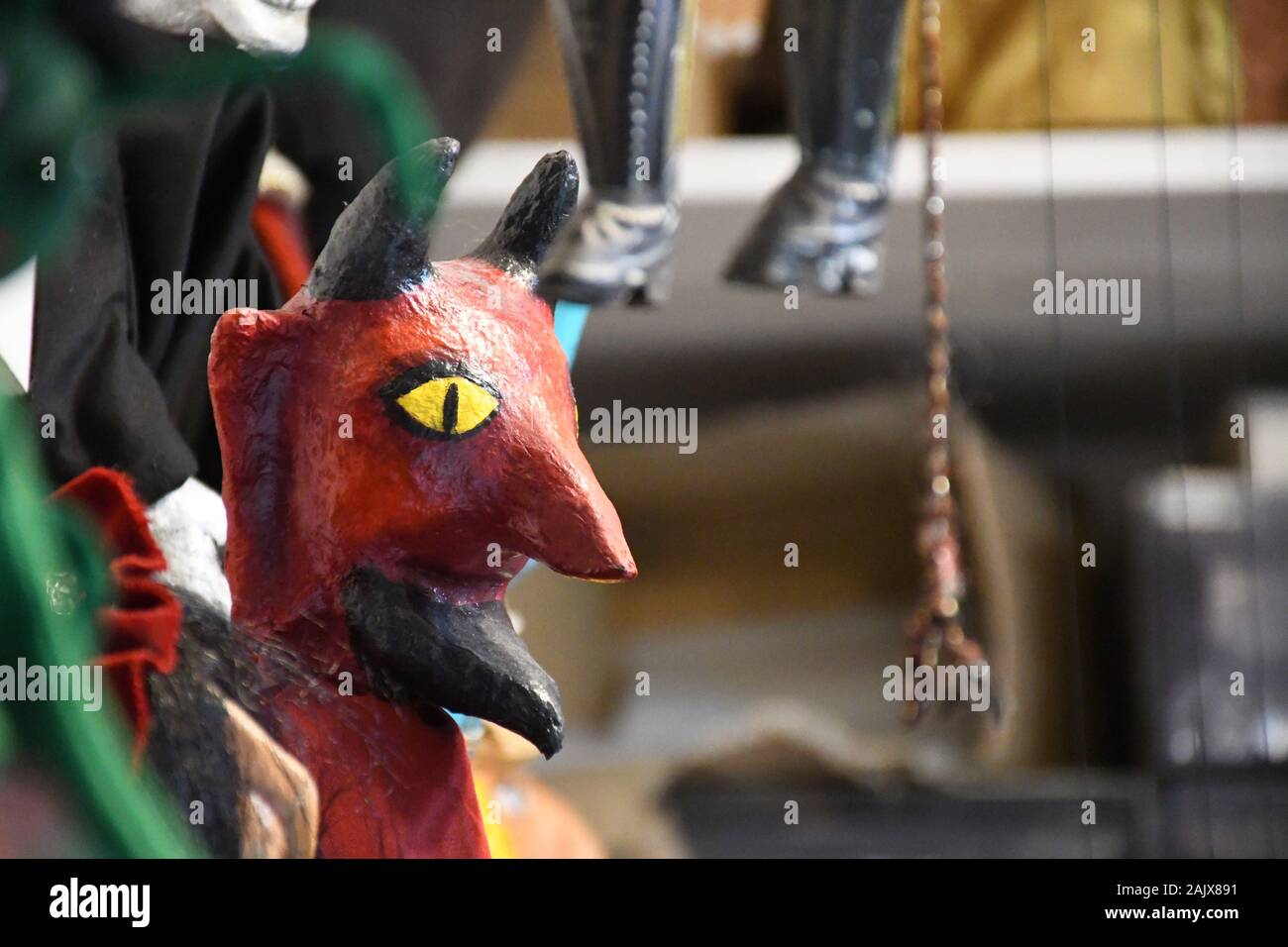 Beautiful devil's wooden marionette or puppet Stock Photo - Alamy