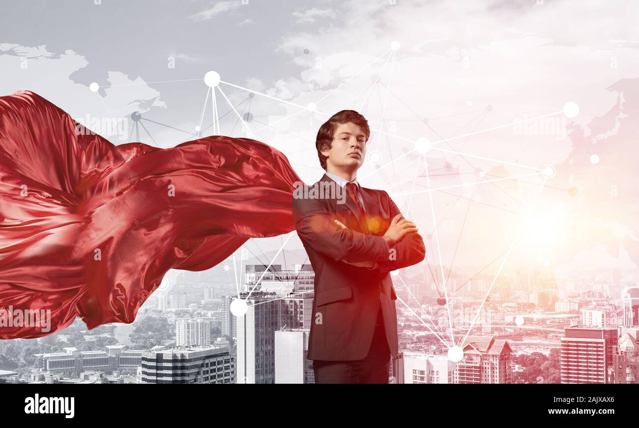 Concept of power and sucess with businessman superhero in big city ...