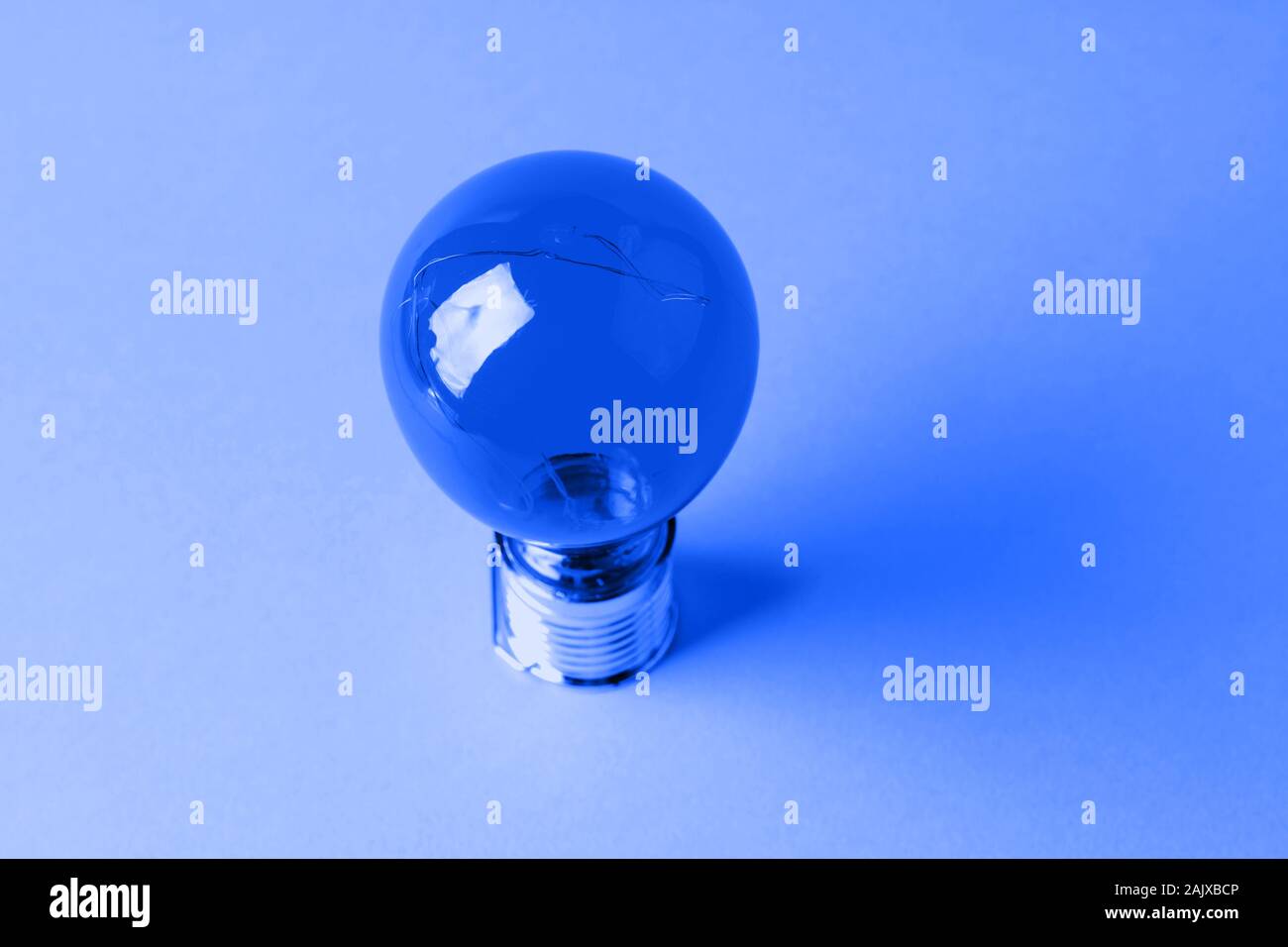 Classic blue solar light bulb concept Stock Photo - Alamy