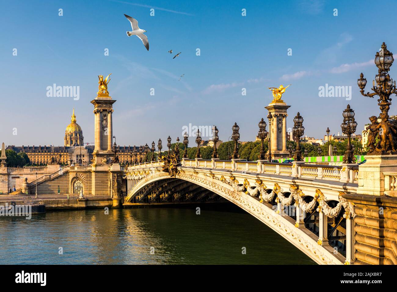 Pont Alexandre III bridge over river Seine in the sunny summer morning ...