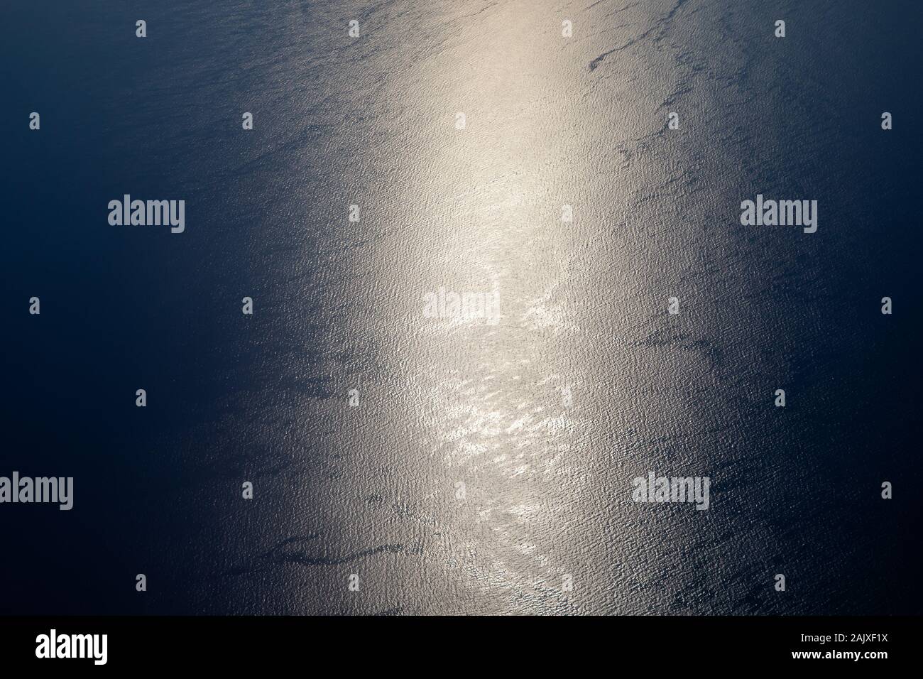 Sunlight twinkling and reflecting off sea water. Sparkles on water. Sun ...