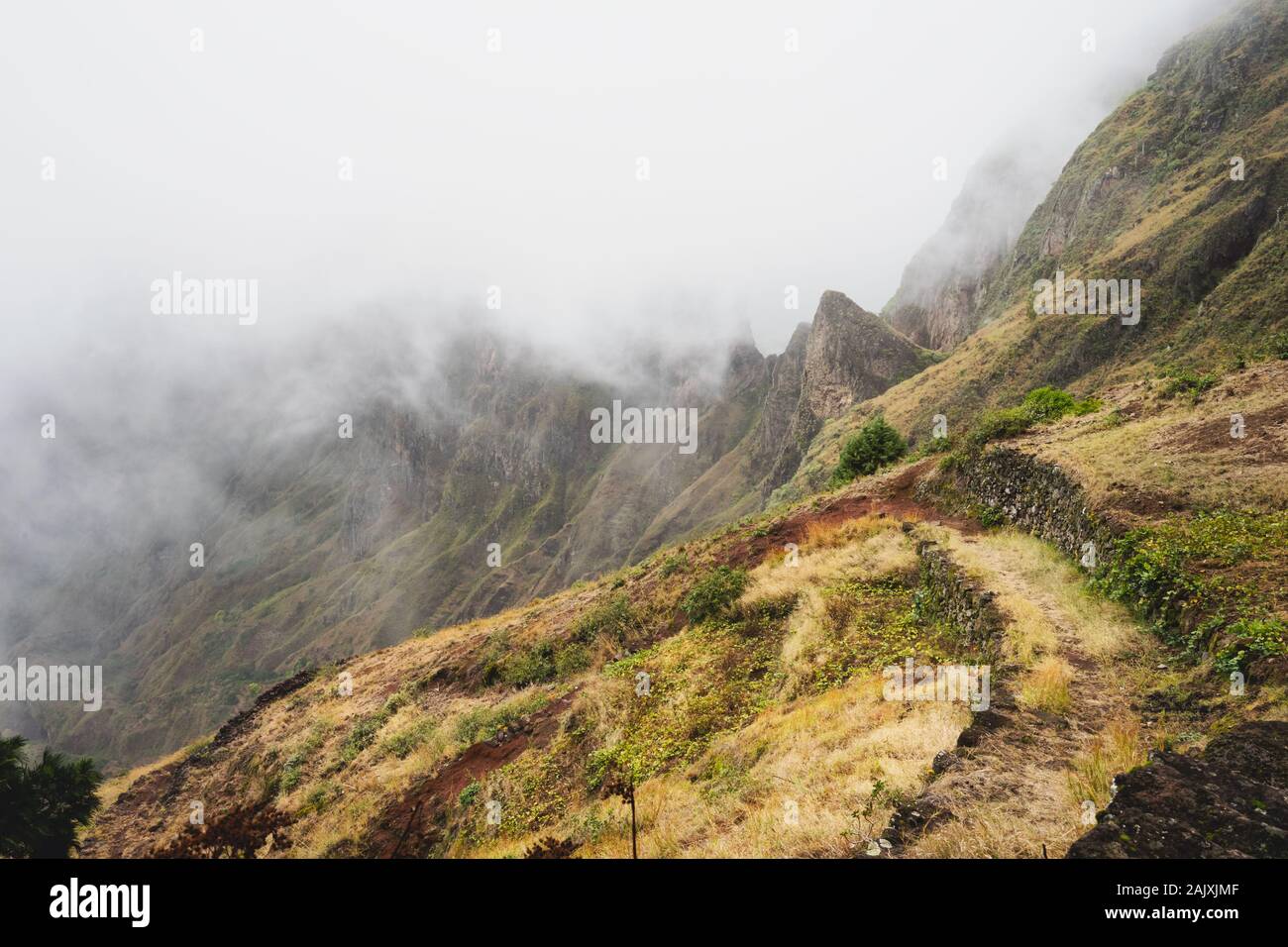 Santo Antao, Cape Verde. Mountain ridge covered in fog on the hike to ...
