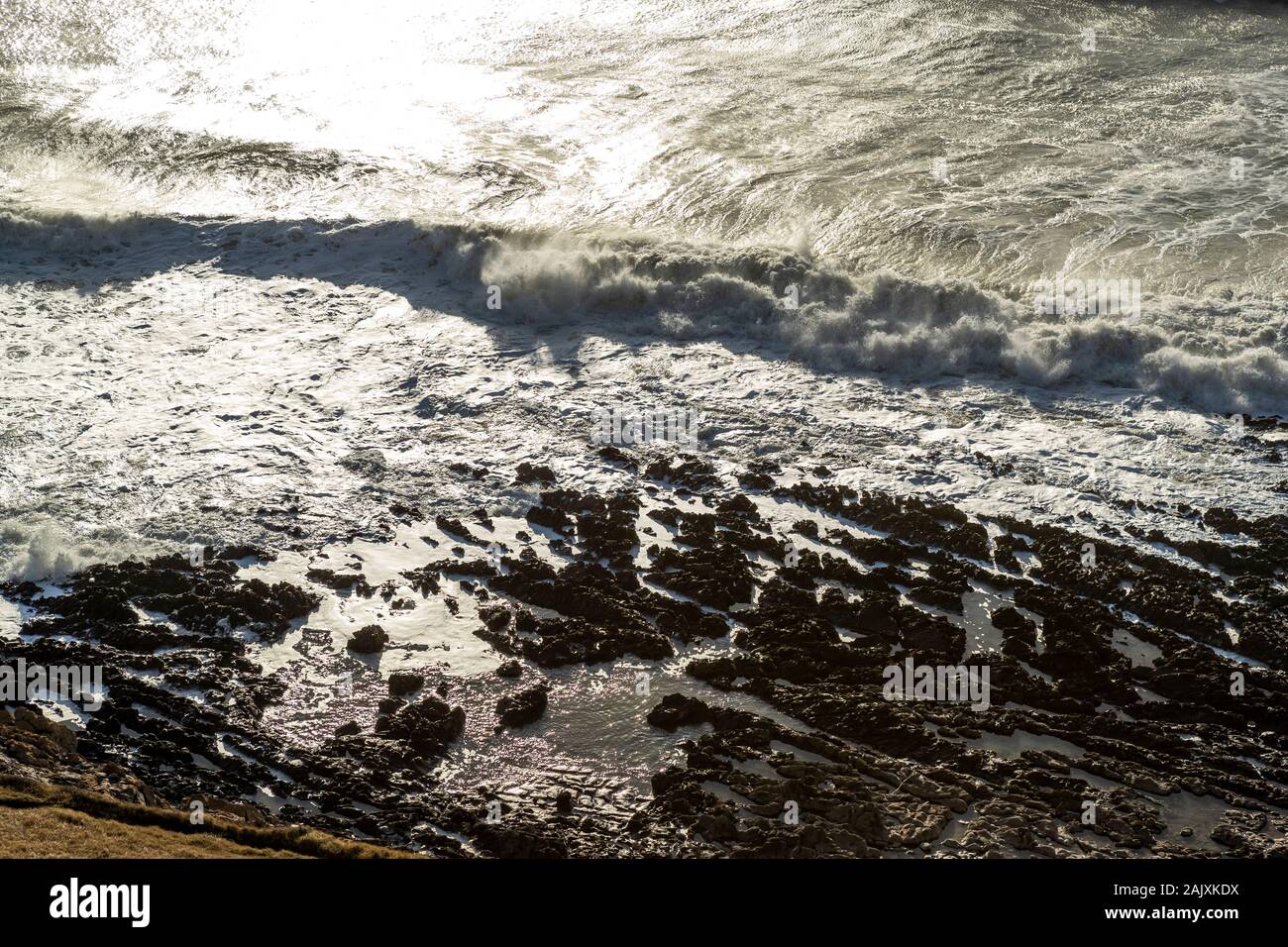 Breaking waves at Overton Cliff. Port Eynon, Gower Peninsula, Wales ...