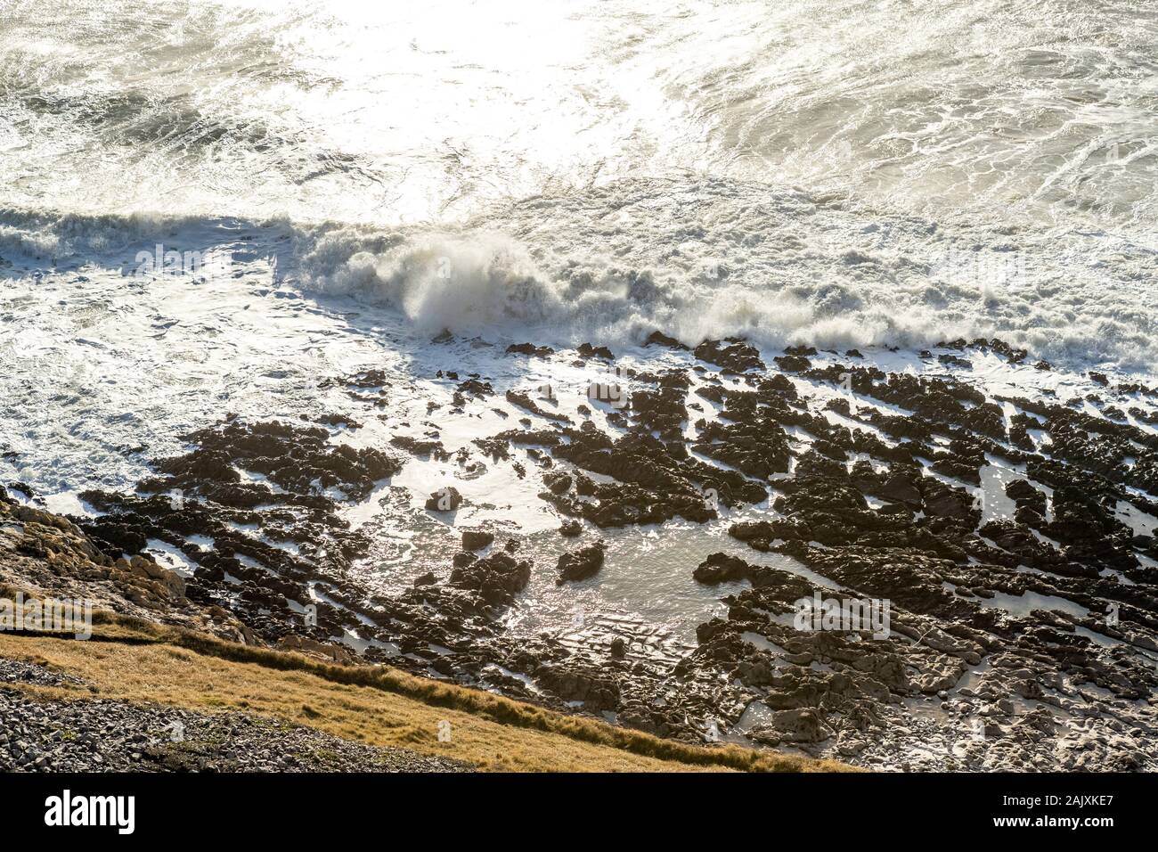 Breaking waves at Overton Cliff. Port Eynon, Gower Peninsula, Wales ...