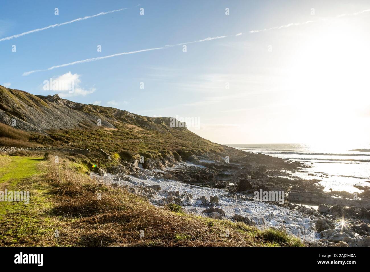 Waves roll in. Port Eynon Point from Overton Cliff, Gower Peninsula ...