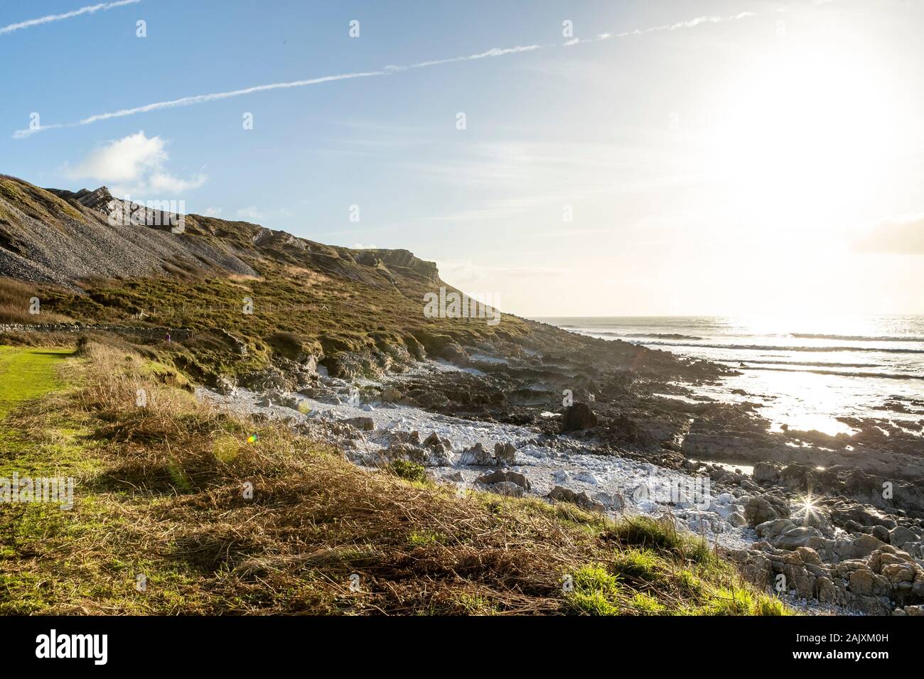 Waves roll in. Port Eynon Point from Overton Cliff, Gower Peninsula ...