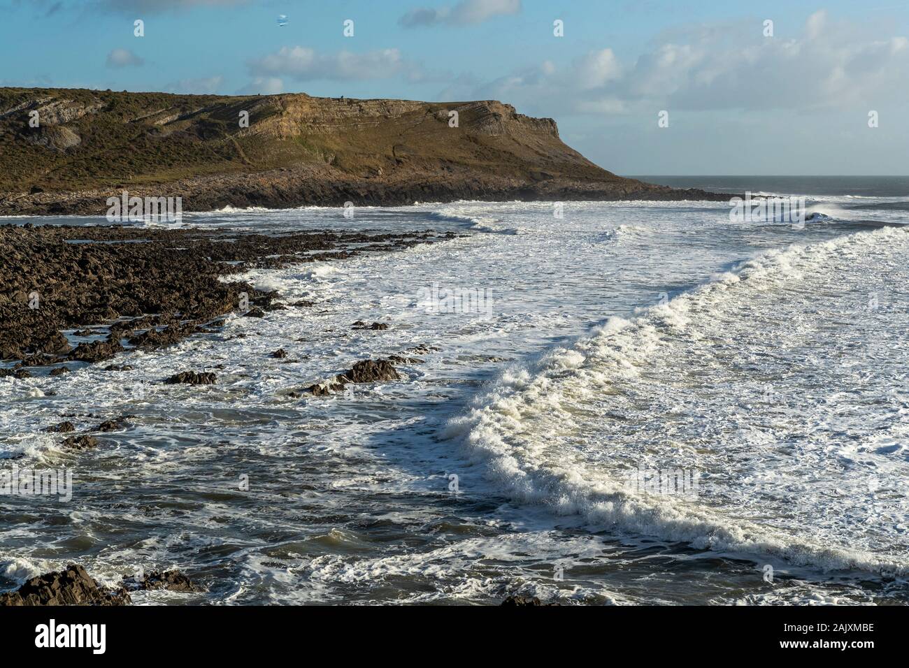 Waves roll in. Port Eynon Point from Overton Cliff, Gower Peninsula ...