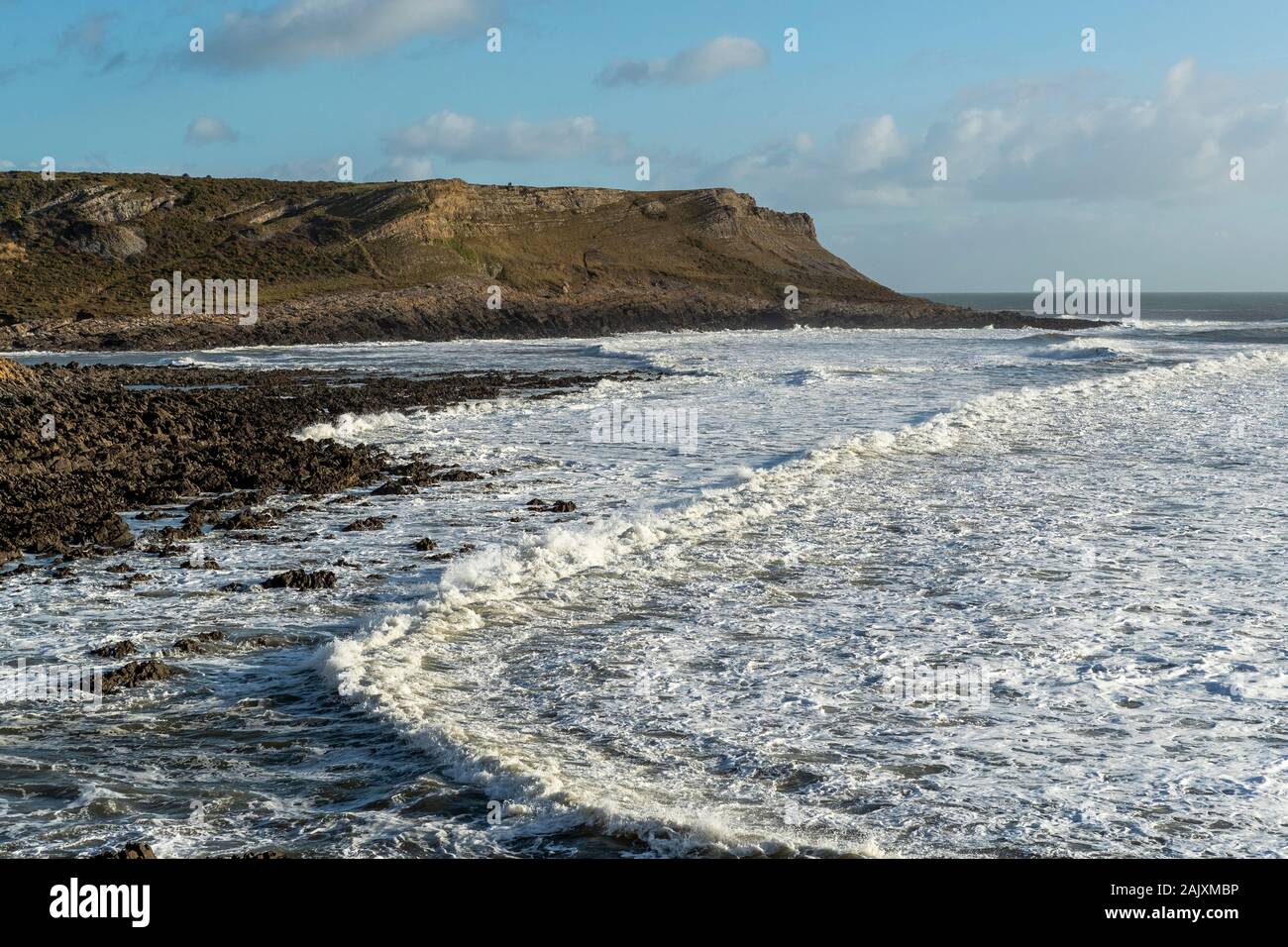Waves roll in. Port Eynon Point from Overton Cliff, Gower Peninsula ...