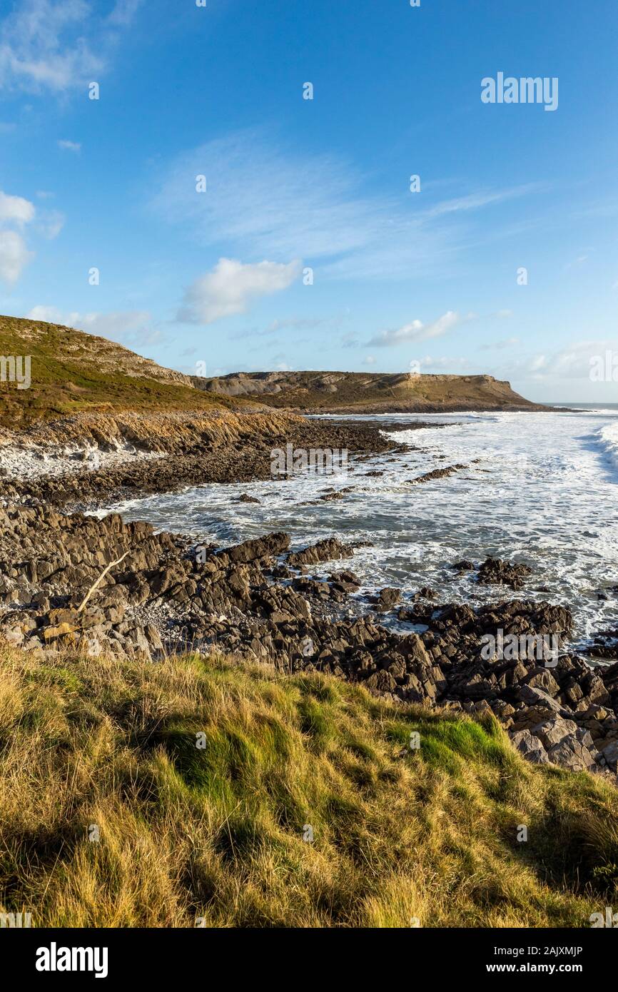 Waves roll in. Port Eynon Point from Overton Cliff, Gower Peninsula ...
