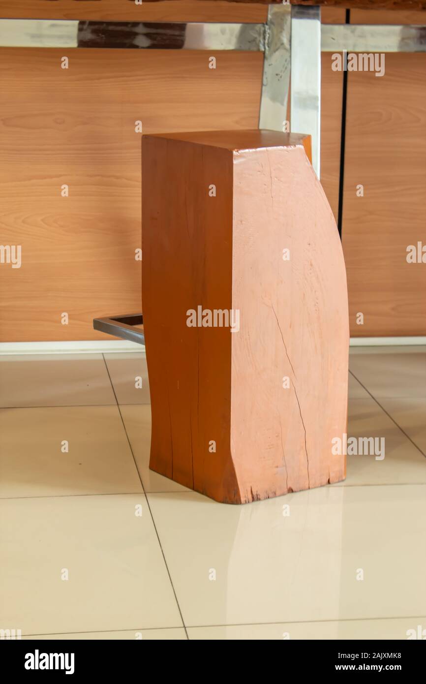Chair made out of wood rods, large and put the foot in stainless steel ...