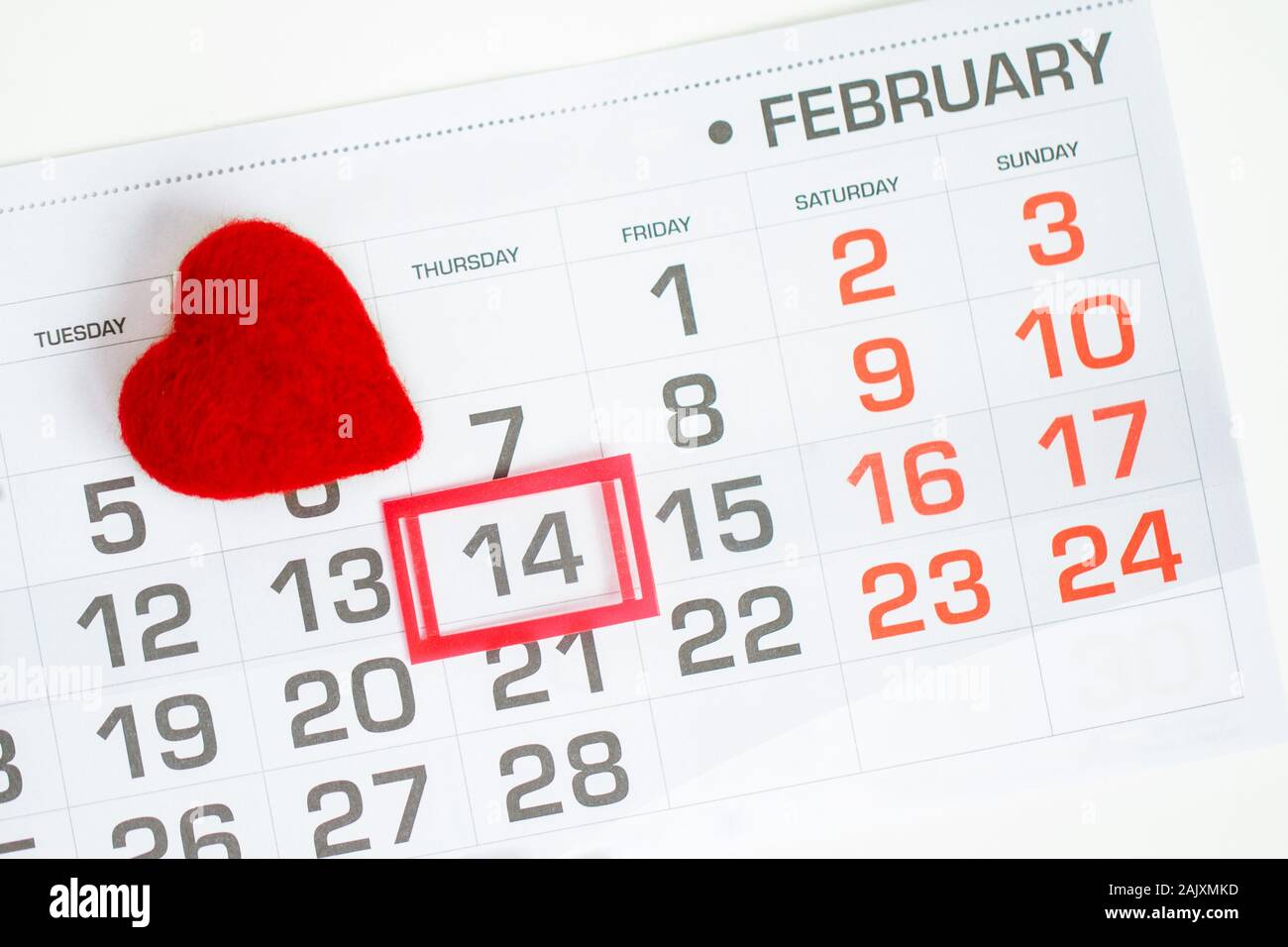 Calendar Page On Saint Valentines Day With Red Heart Stock Photo - Alamy
