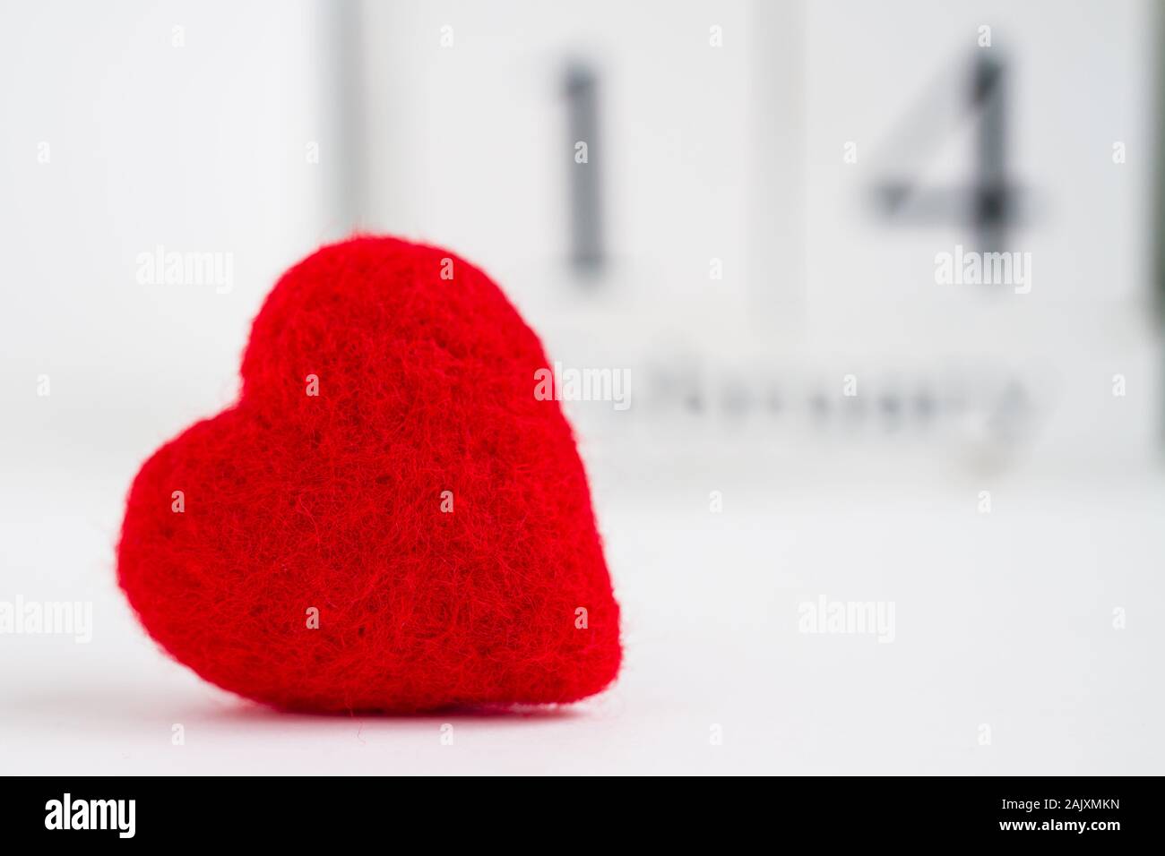 Cube calendar with red heart isolated on white. Valentines day Stock ...