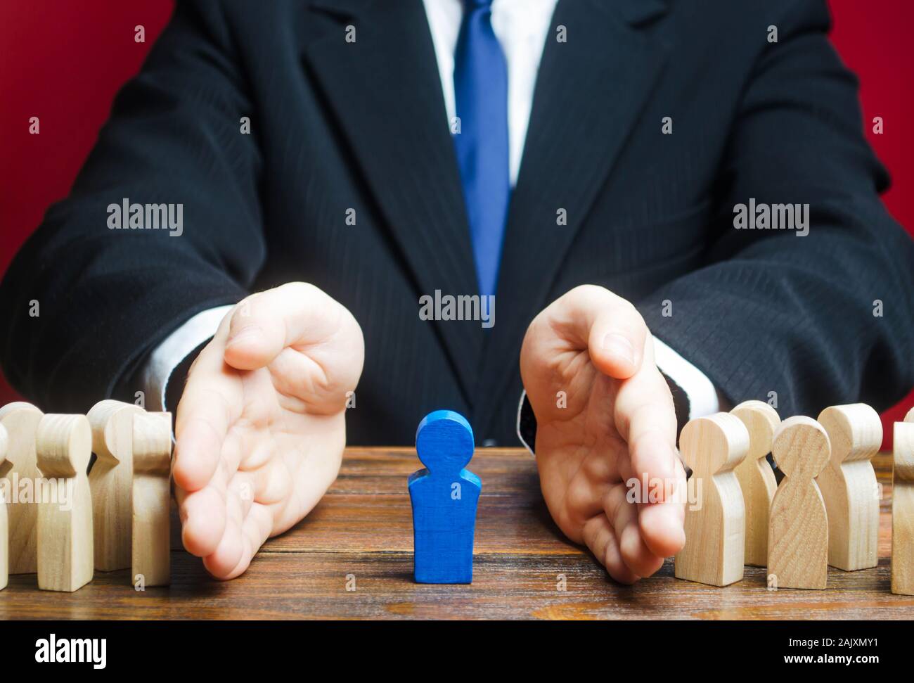 A businessman highlights a blue human figure from the crowd. Best ...
