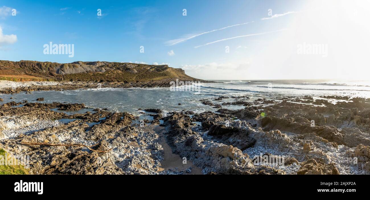 Waves roll in. Port Eynon Point from Overton Cliff, Gower Peninsula ...