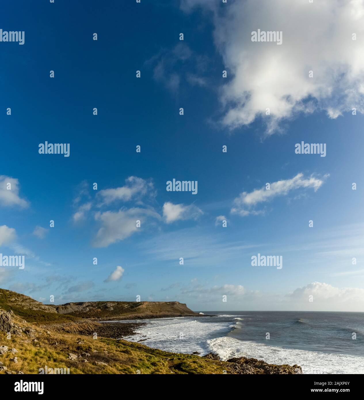 Waves roll in. Port Eynon Point from Overton Cliff, Gower Peninsula ...