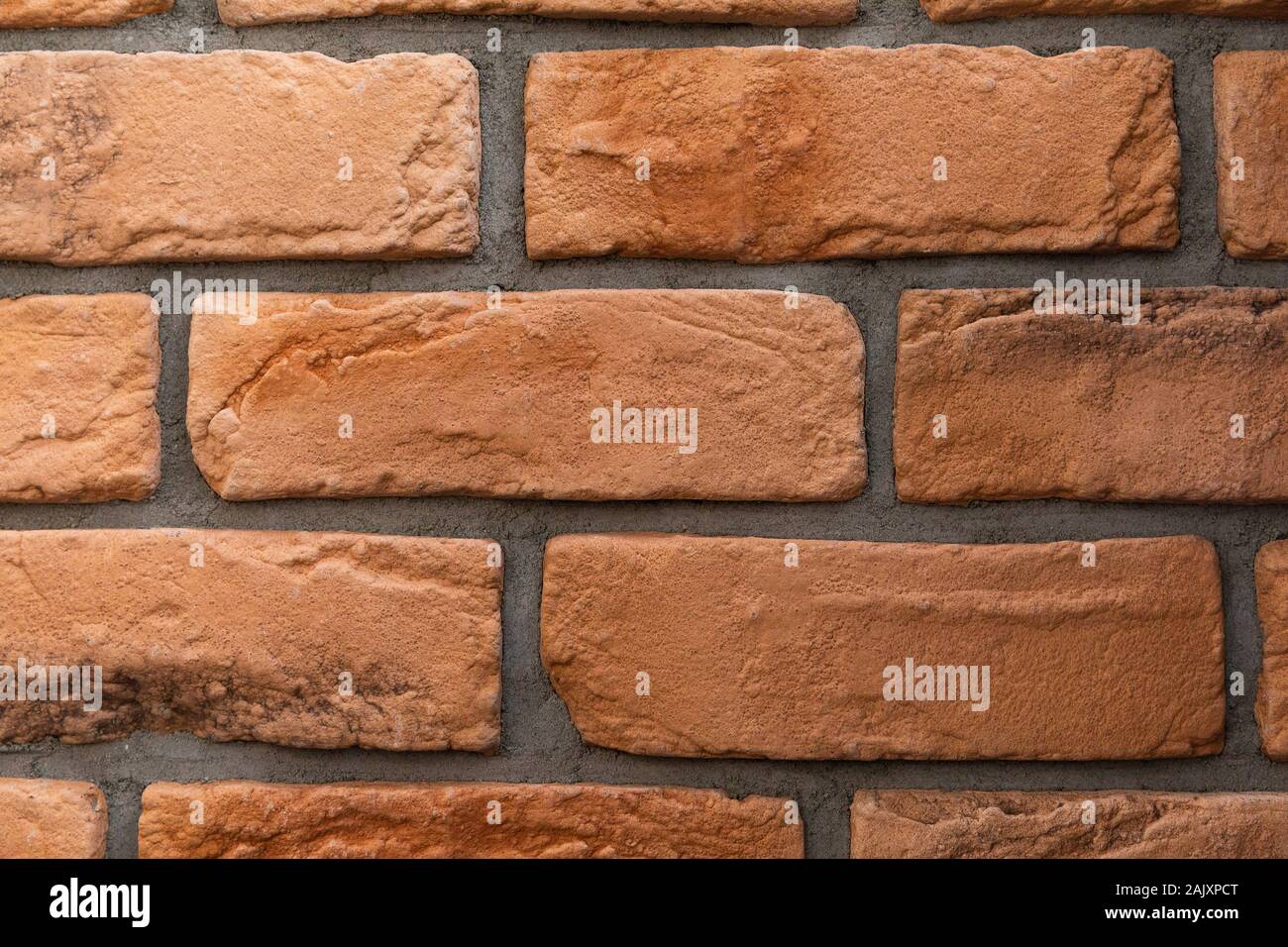 facade panel in antique brick of terracotta color Stock Photo - Alamy