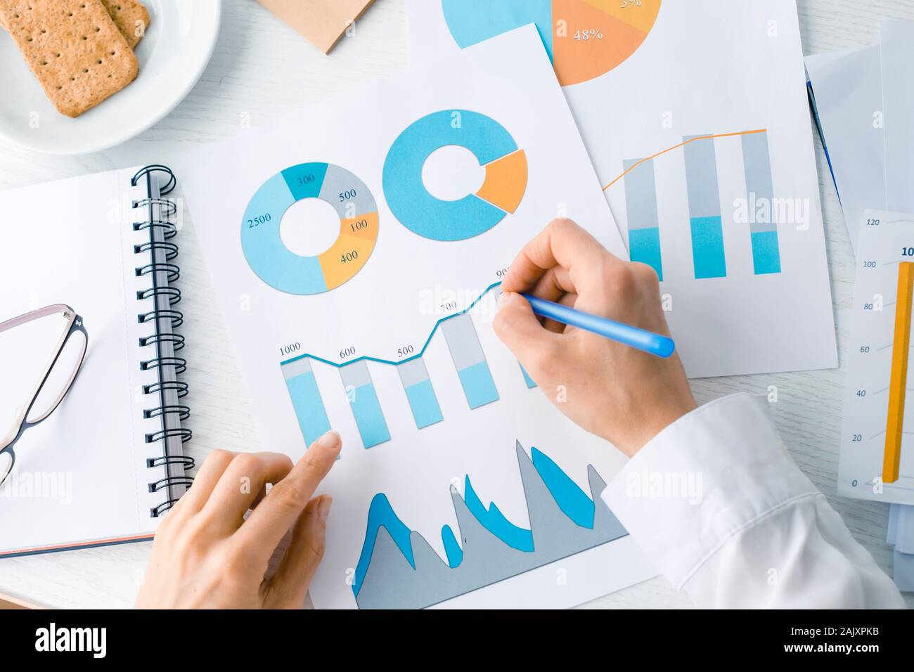 Teamwork business people analysis graph on desk at meeting Stock Photo ...