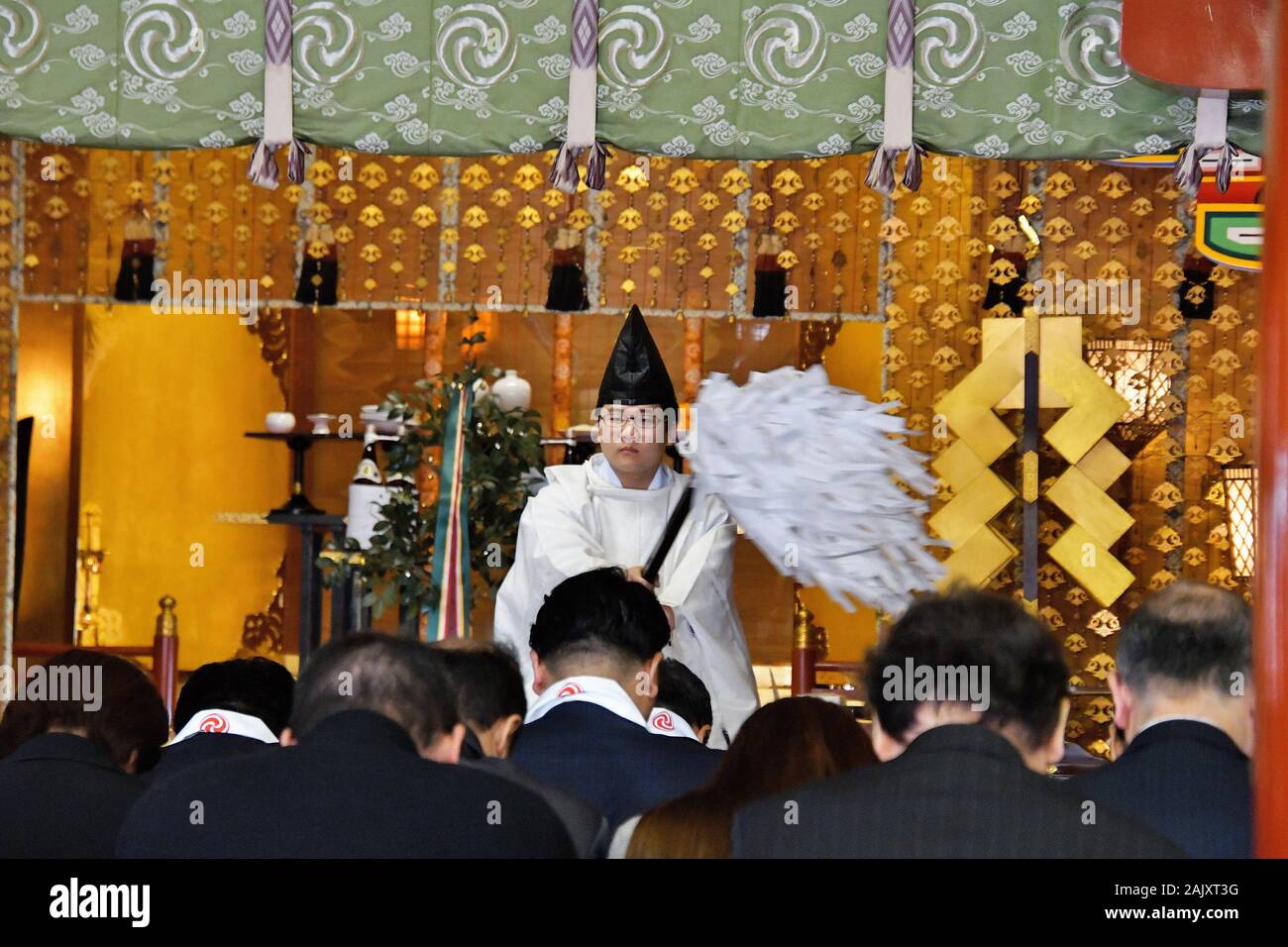 Tokyo, Japan. 06th Jan, 2020. A Shinto priest performs the "Oharai ...