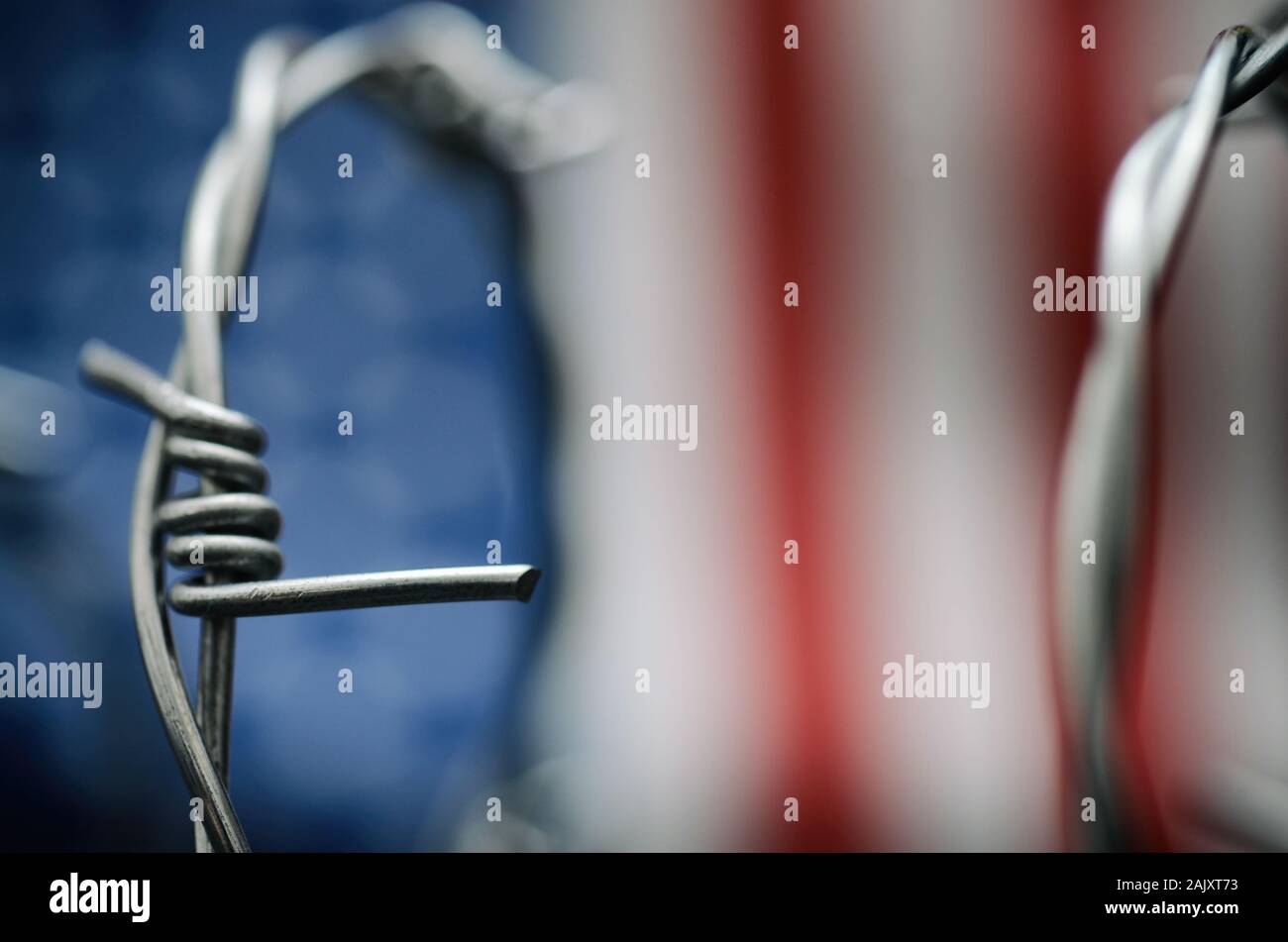Barbed wire and United States of America flag , immigration concept ...