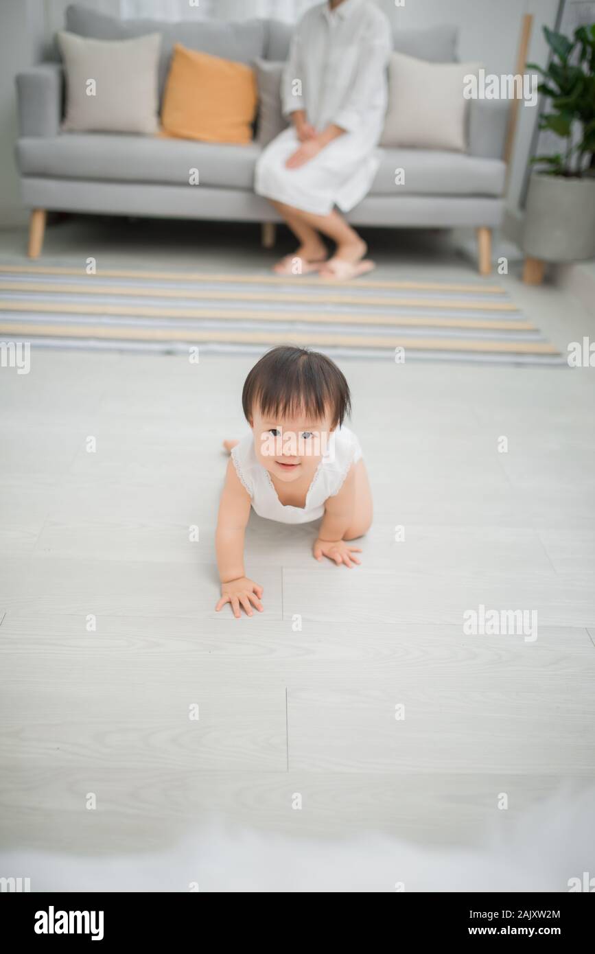 Toddler crawling playground hi-res stock photography and images - Alamy