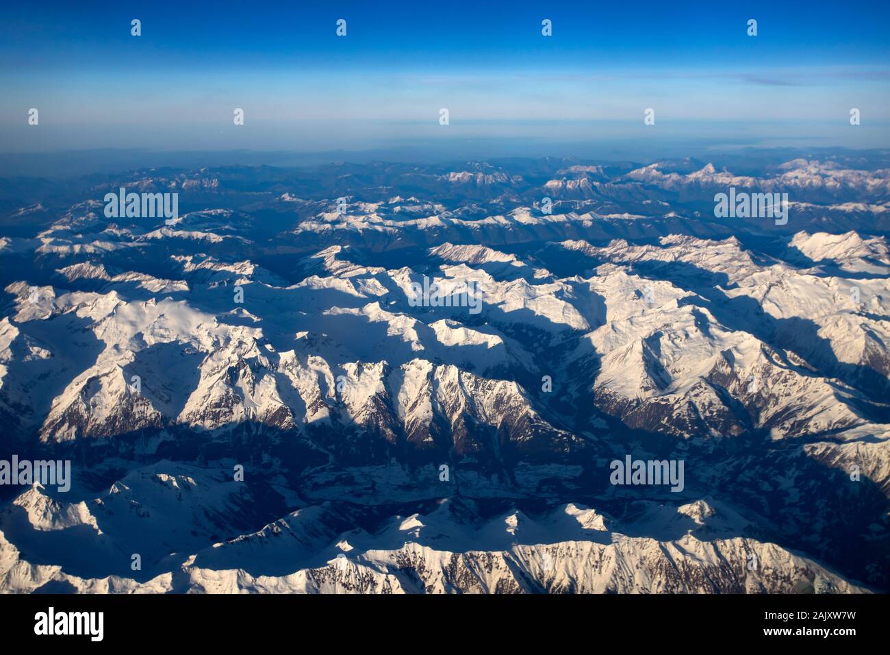 Aerial view of Dolomites mountain range from airplane window Stock ...