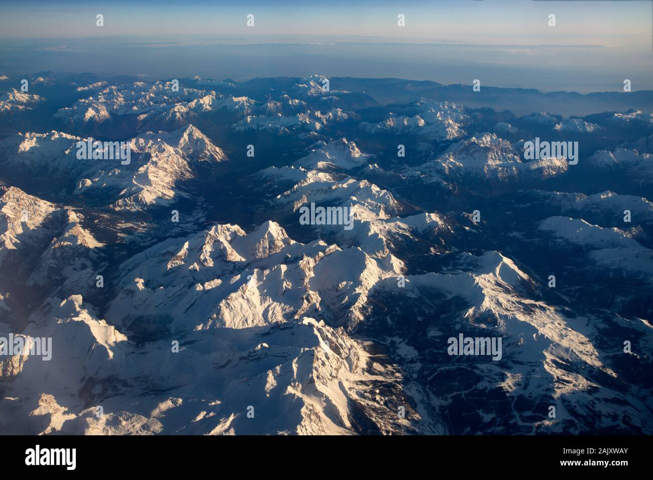 Aerial view of Dolomites mountain range from airplane window Stock ...