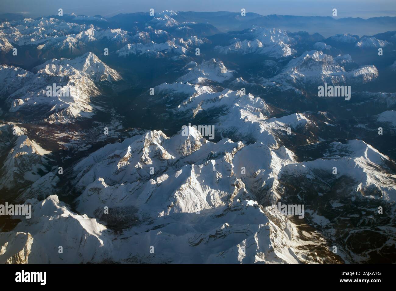 Aerial view of Dolomites mountain range from airplane window Stock ...