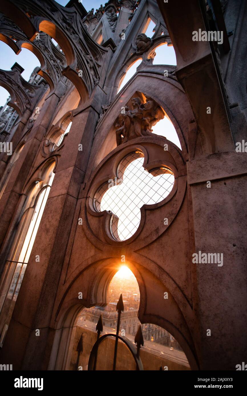 Beautiful sunset viewed by the window of the Milan Duomo, Italy Stock ...