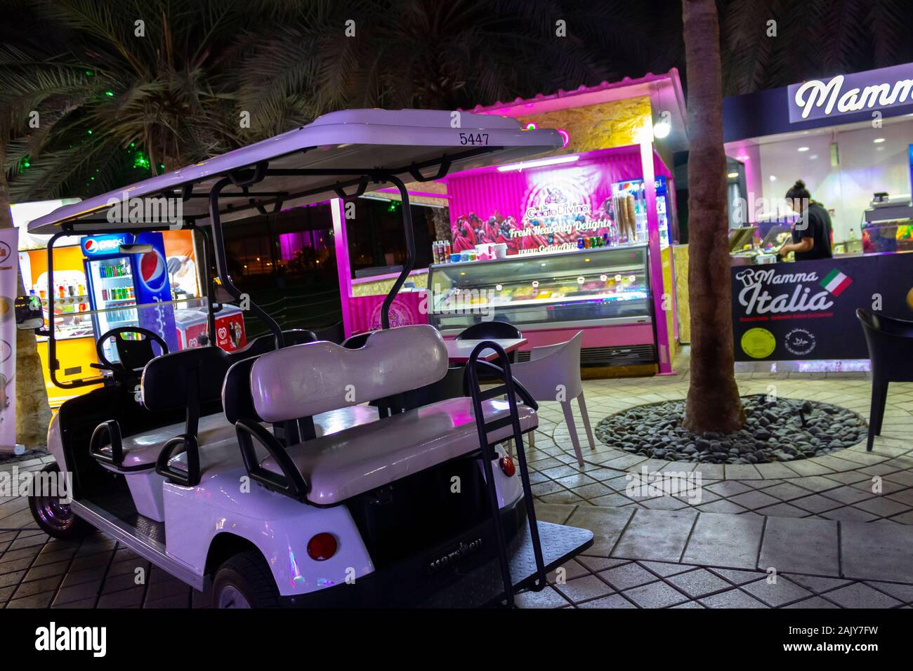 Dubai, UAE - December 3, 2018: A freight electric car stands near a ...