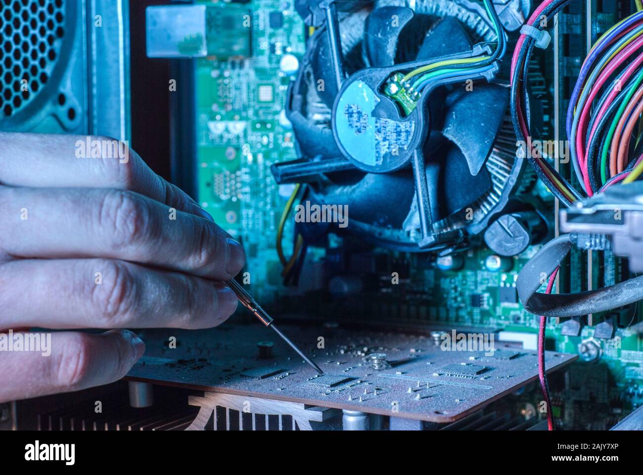 Close-up of professional equipment master repairing computer software ...