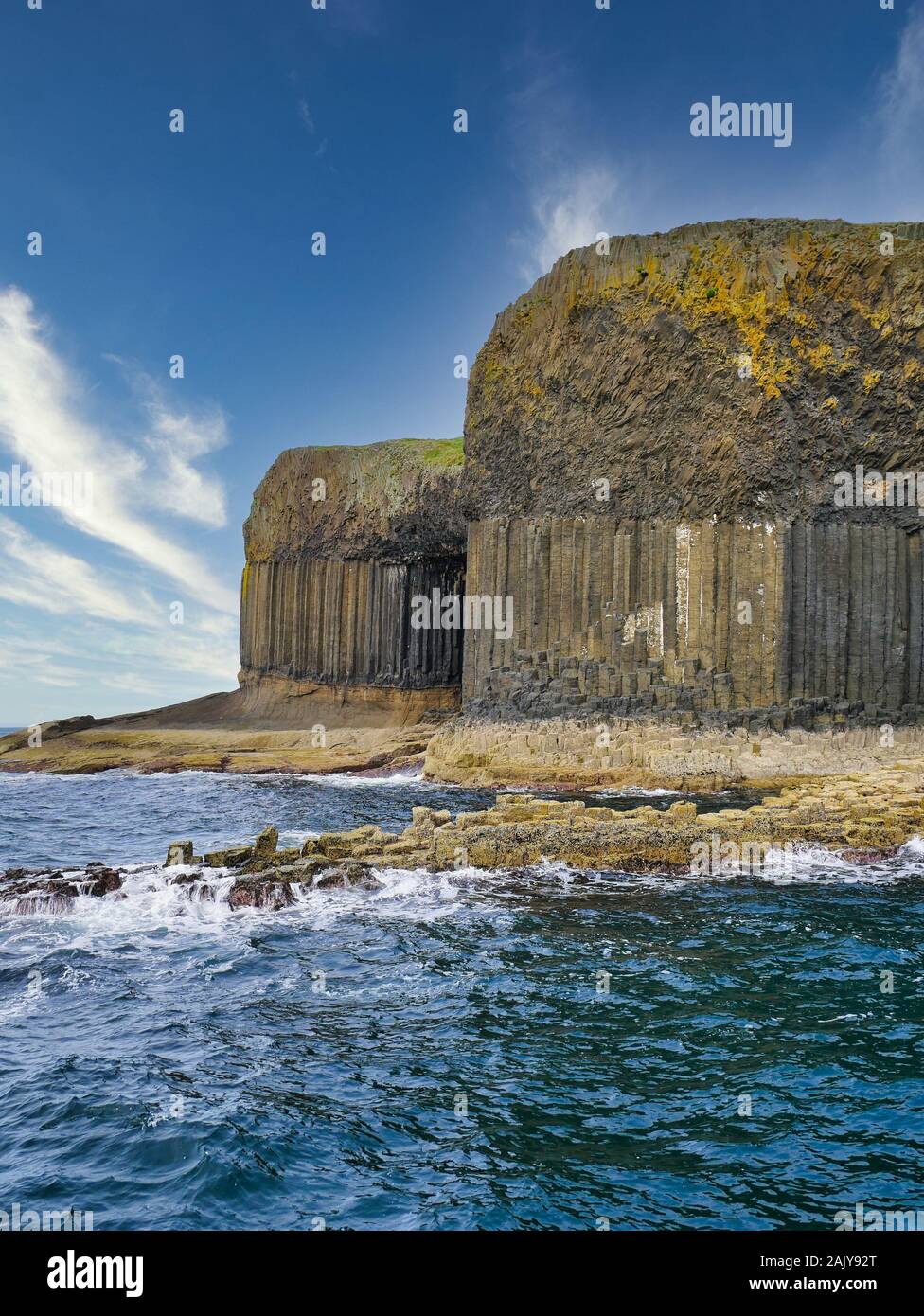 Columns of jointed volcanic basalt rock in which the vertical joints ...