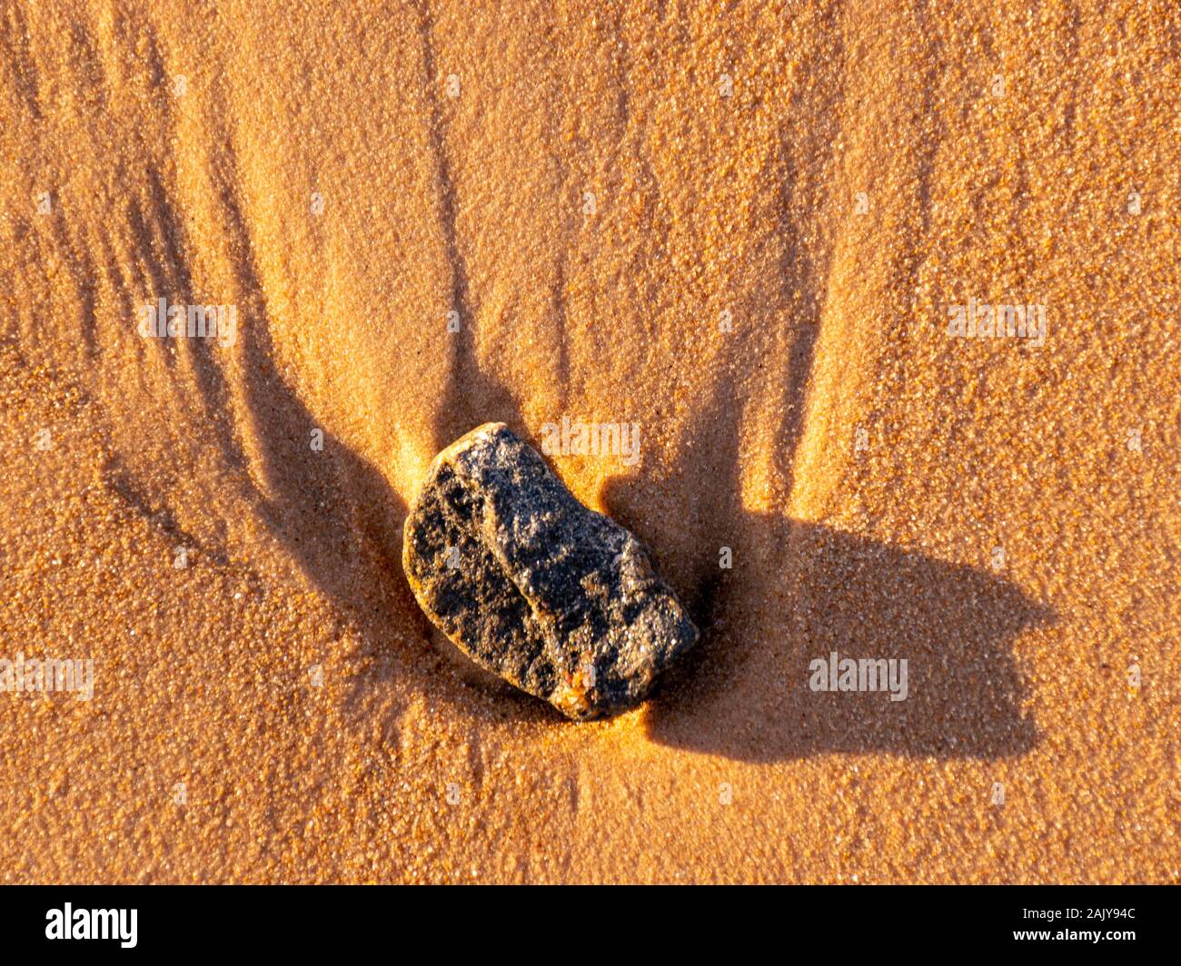 abstract texture with sand texture, sea water and sand formations on ...