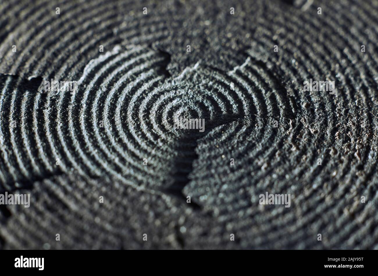 Macro of old and damaged metal heating element from electric range ...