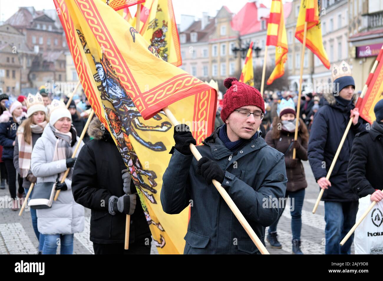 Lublin, Poland 01/06/2020 men carrying colorful flags at a traditional ...