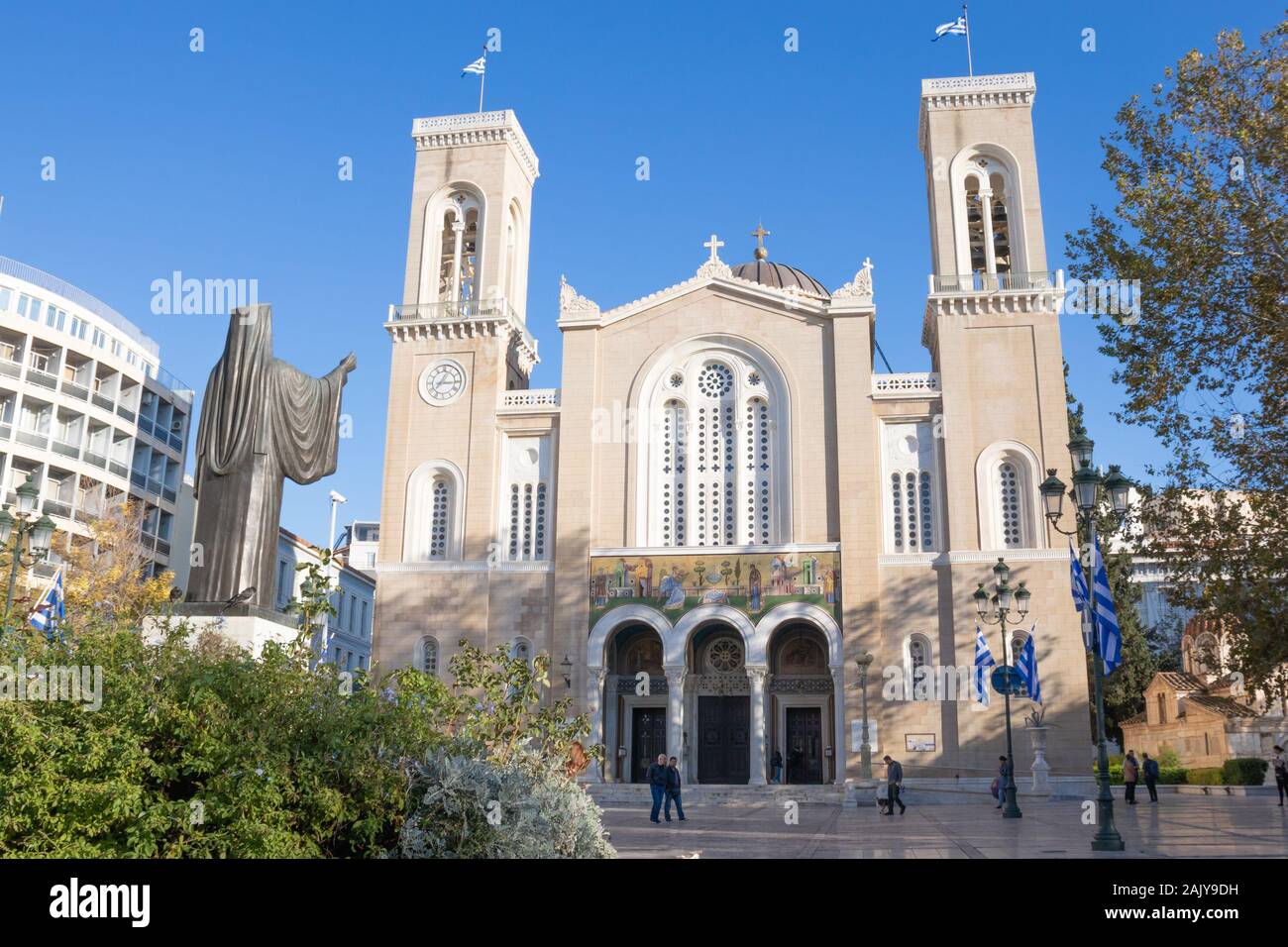 Greek church on a square with a monument in front Stock Photo - Alamy