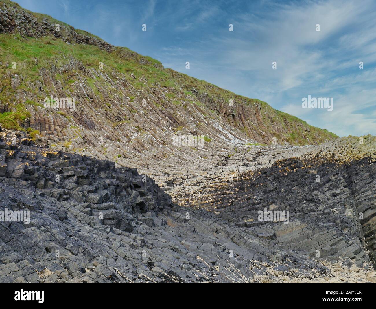 Columns of jointed volcanic basalt rock in which the vertical joints ...