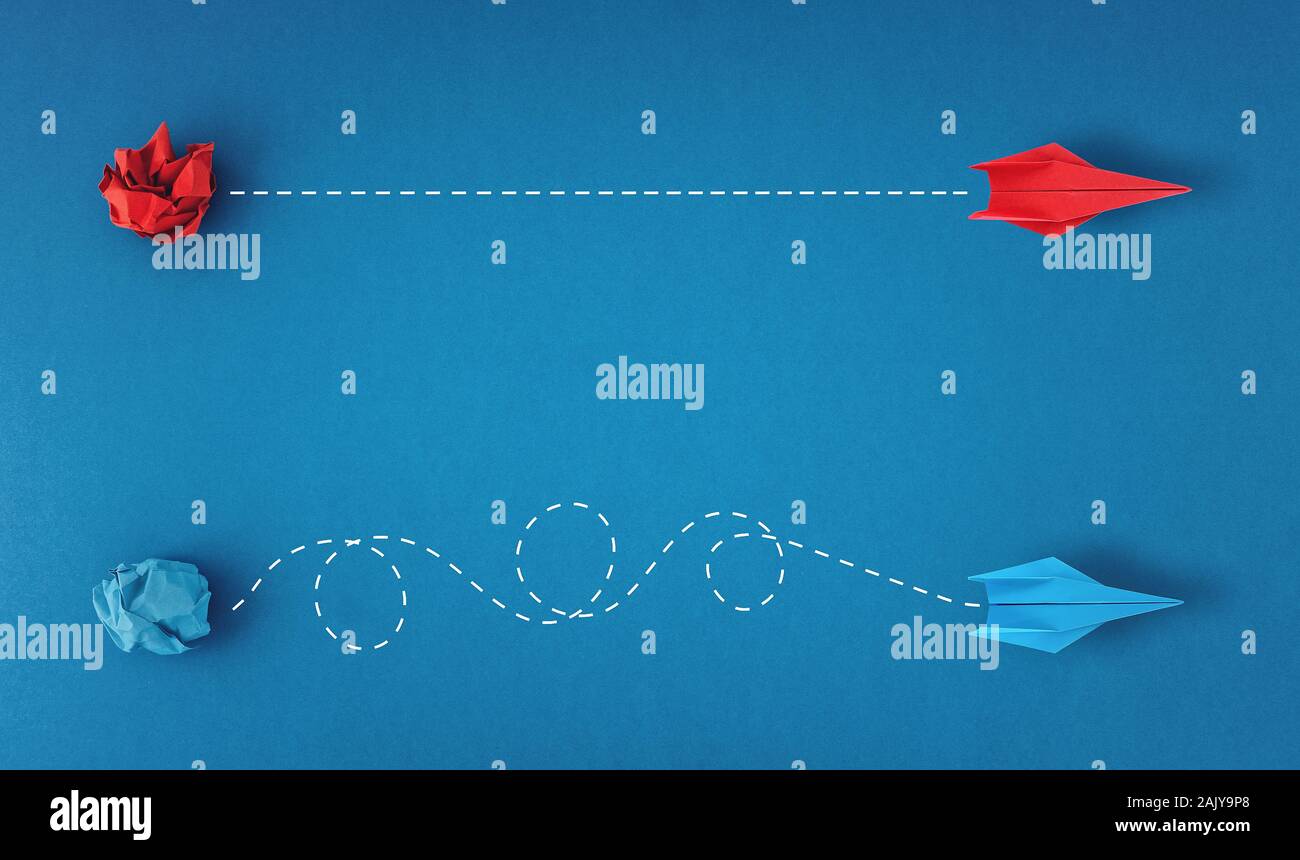 Flying red and blue plane origami choose the right and simple path ...