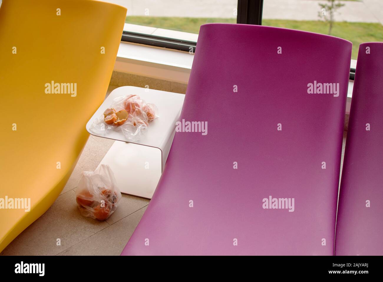 The remains of food in plates, crumbs on the table after lunch or ...