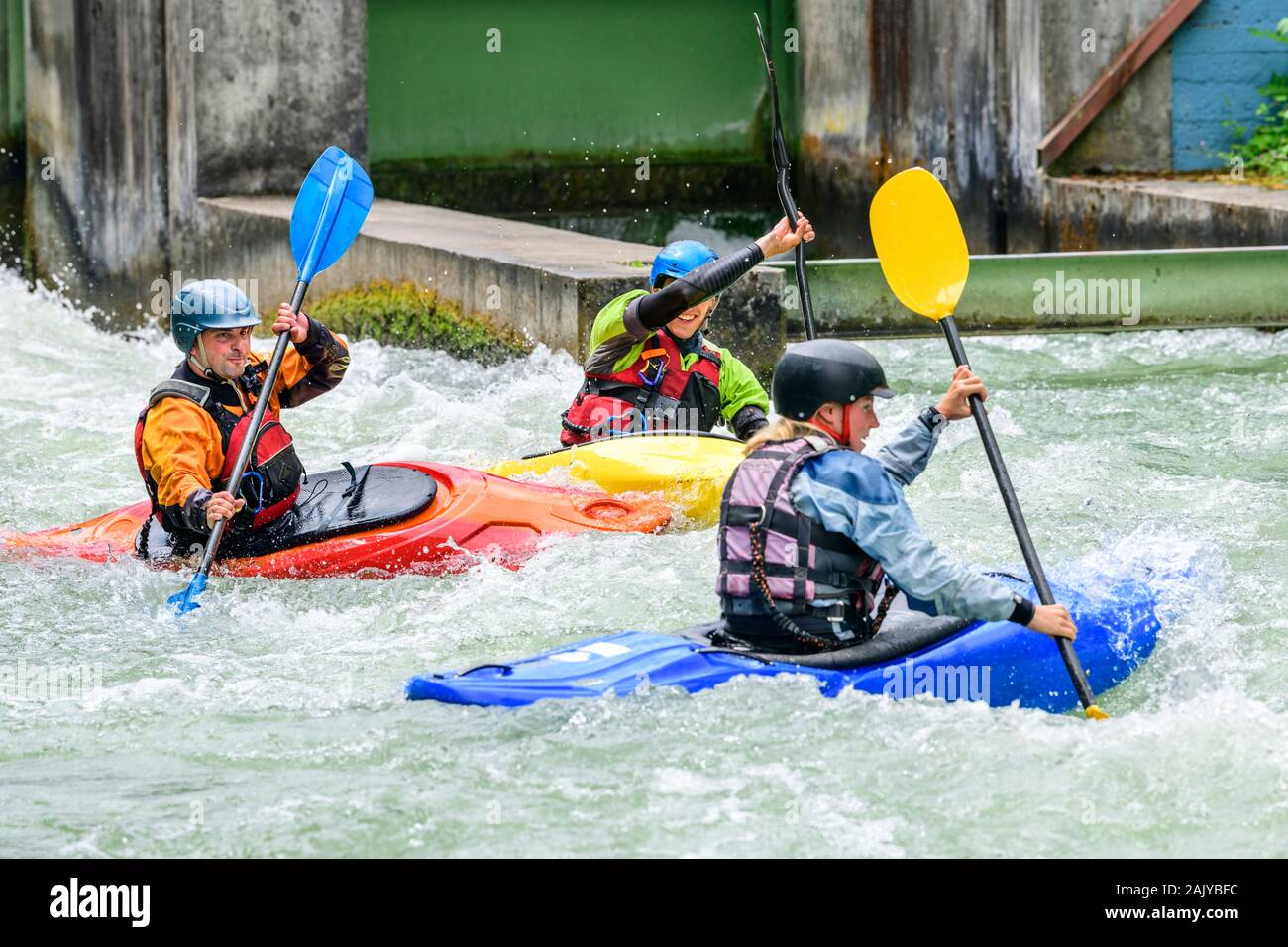 Kayaking on an artificial wild water channel Stock Photo - Alamy